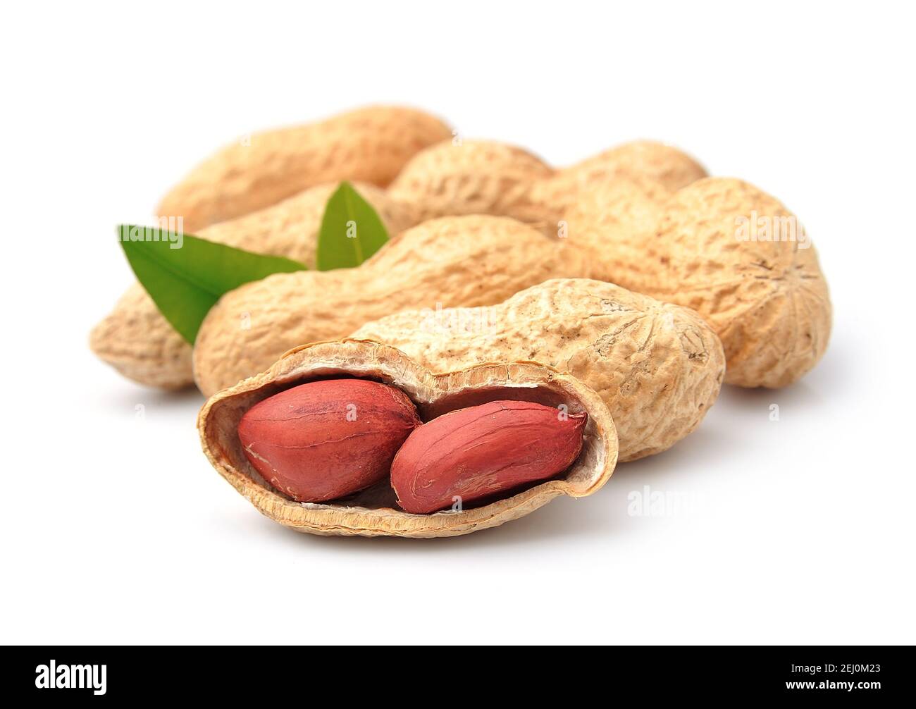 Peanuts close up on white background Stock Photo - Alamy