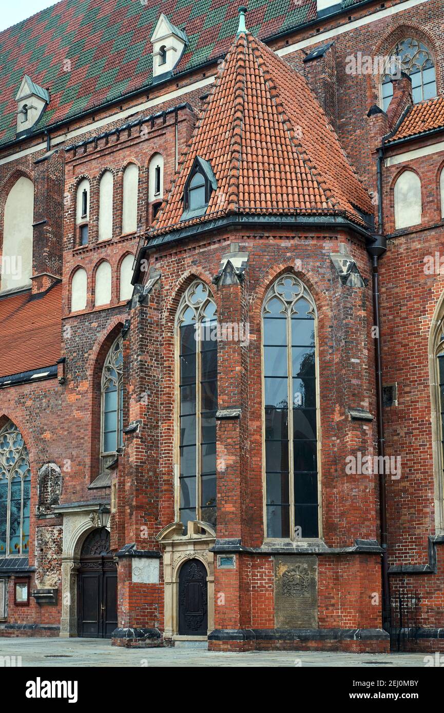 Gothic portal with stone carvings in medieval church in Wroclaw Stock ...