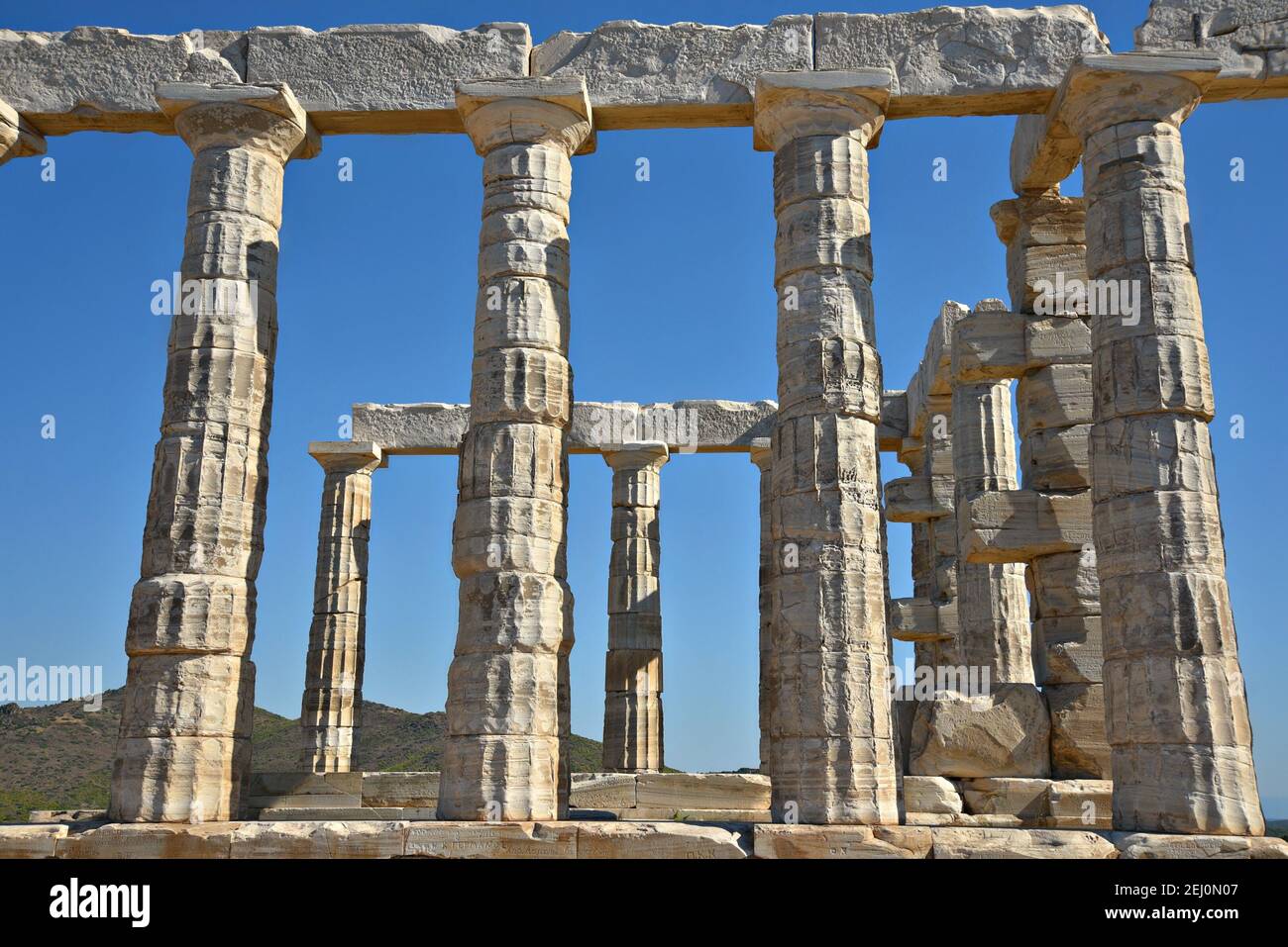 Marble columns view of the ancient Greek Doric style Temple of Poseidon ...