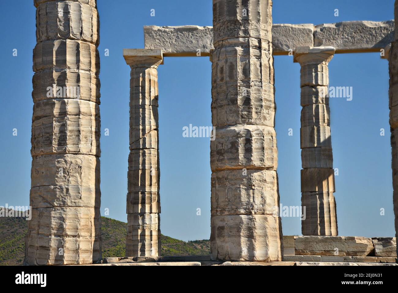 Marble columns view of the ancient Greek Doric style Temple of Poseidon ...