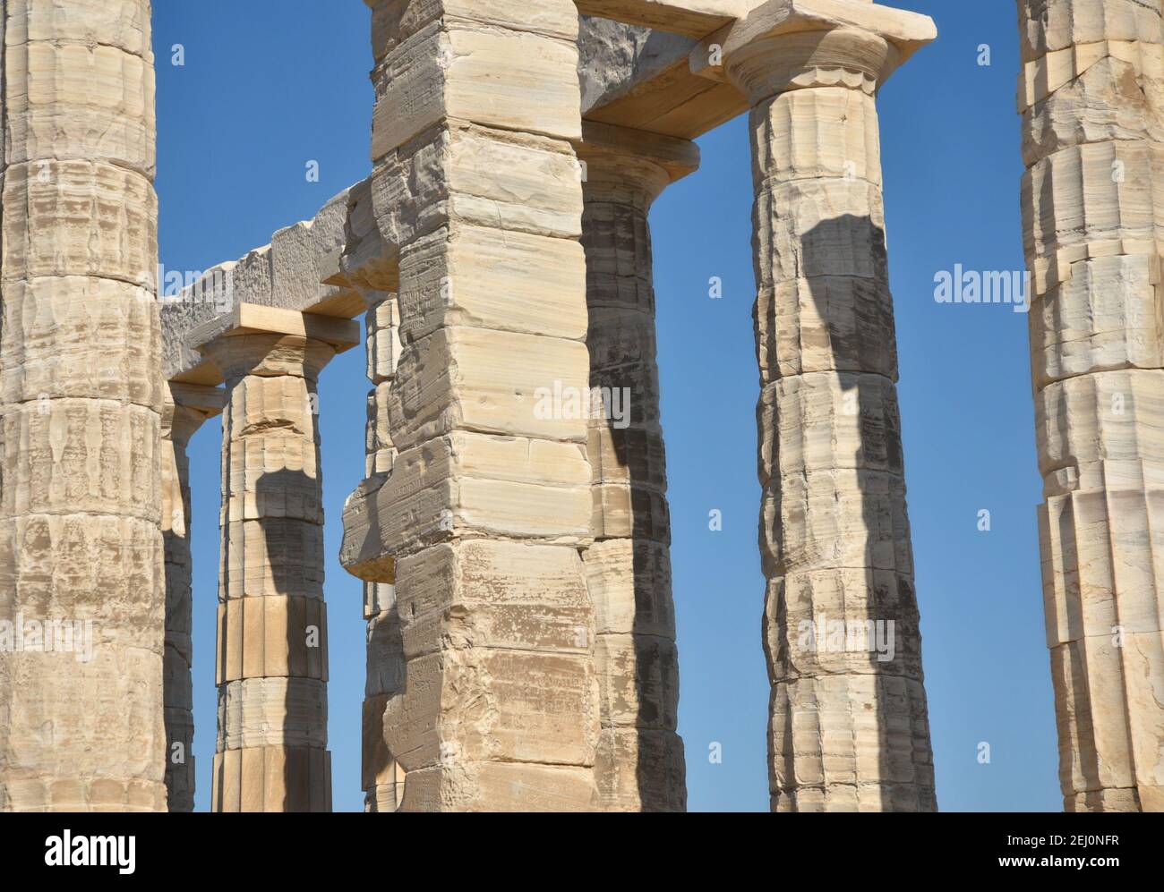 Marble columns view of the ancient Greek Doric style Temple of Poseidon ...