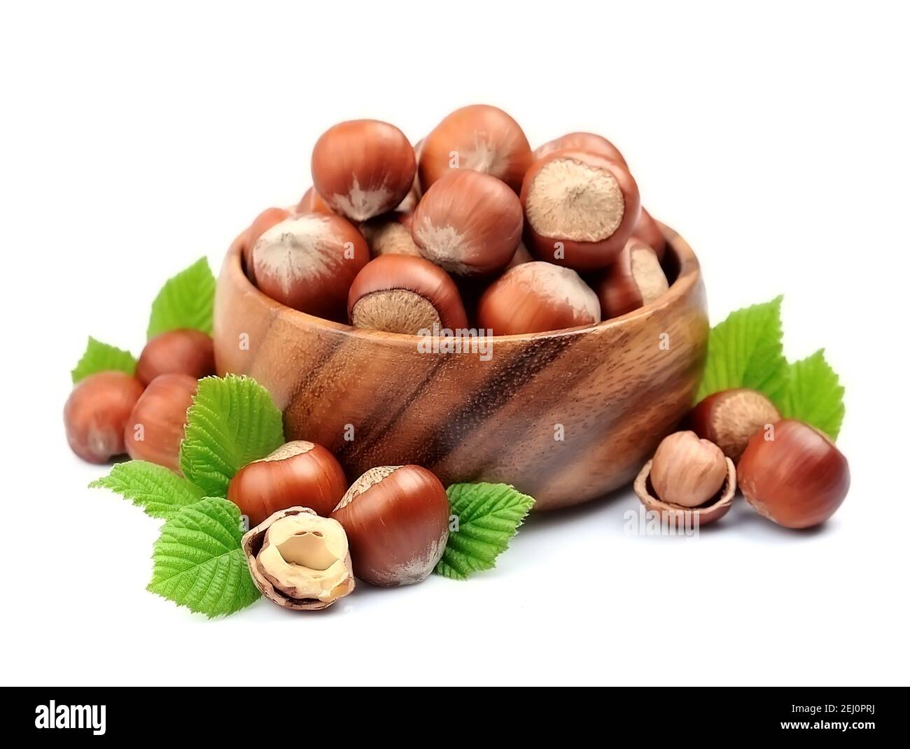 Filbert nuts with leaf on white background Stock Photo - Alamy