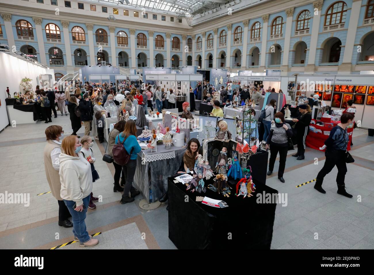 Moscow, Russia. 20th Feb, 2021. People visit the international doll ...