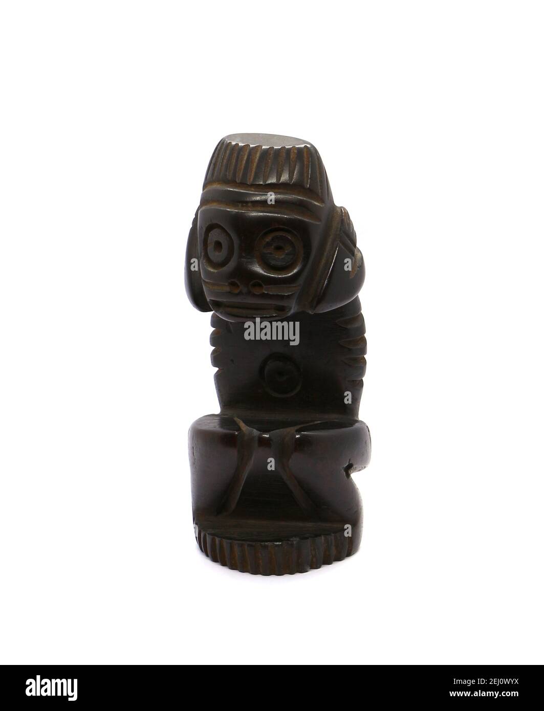 Photo of a Small carved wooden object from Africa with a primitive ...