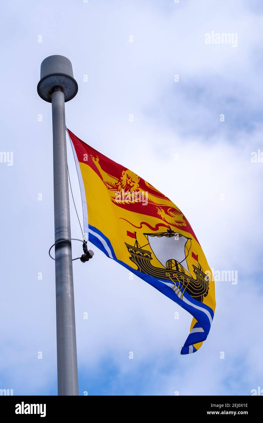 The flag of the Canadian province of New Brunswick (NB) flying on a ...