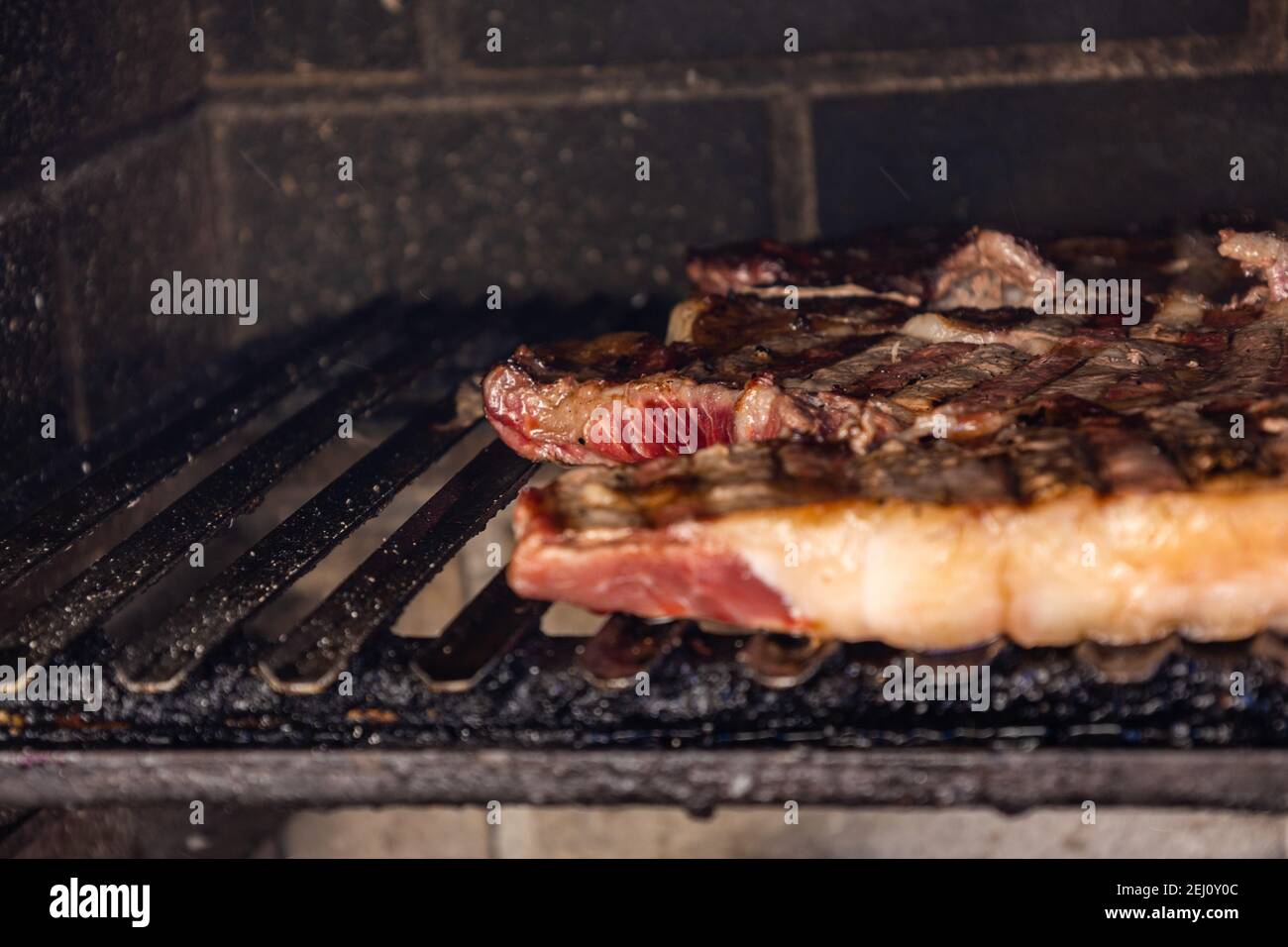 Process of making meat steak in the kitchen Stock Photo - Alamy