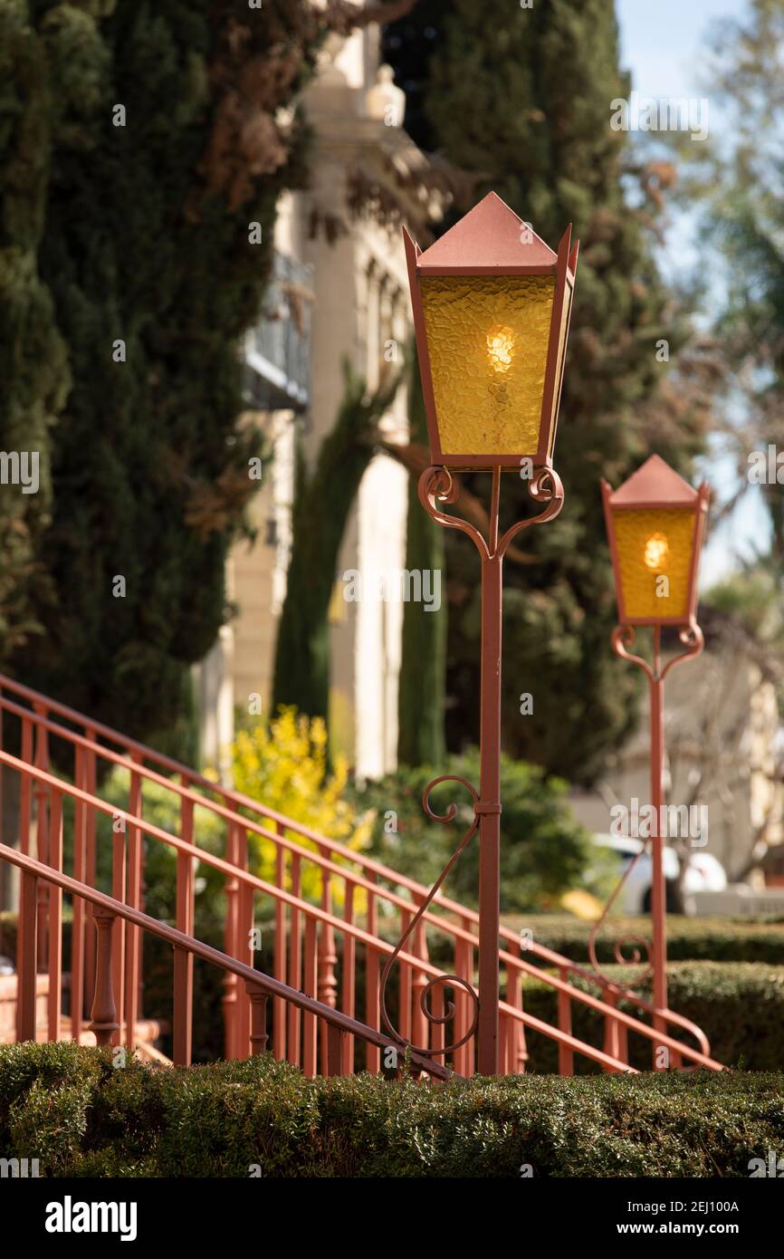 Daytime view of historic street lights and trees of downtown Riverside ...
