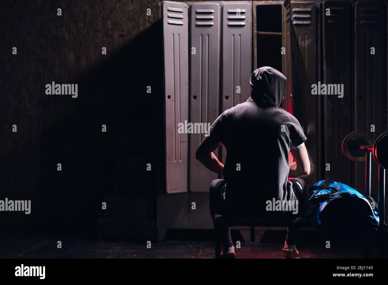 Man get ready for boxing training in the locker room Stock Photo - Alamy