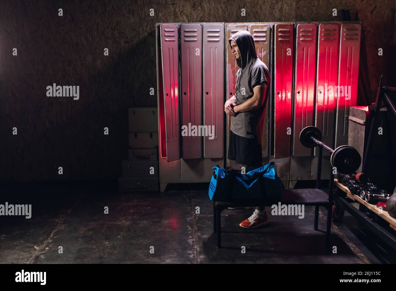 Man get ready for boxing training in the locker room Stock Photo - Alamy