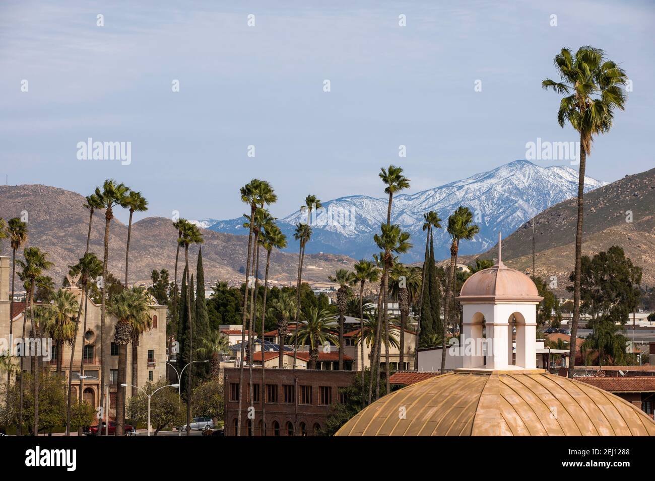 Snow capped mountain view of the historic skyline of Riverside ...
