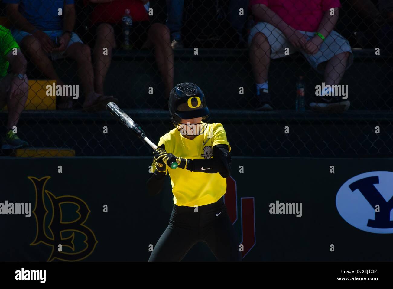 A Female Softball Player Is At Bat Getting Ready To Hit The Pitch Stock ...