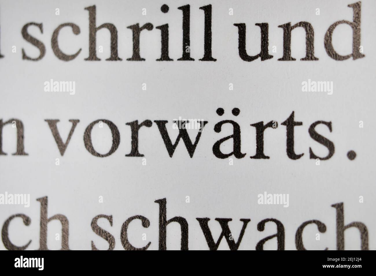 Closeup of the German word "vorwärts" with the letter "ä" in focus ...