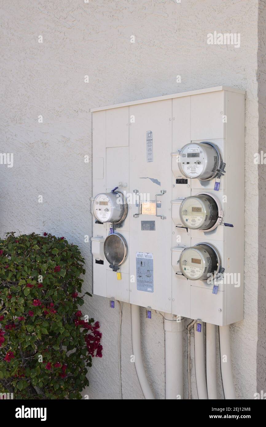 Multiple electric meters on a panel Stock Photo - Alamy