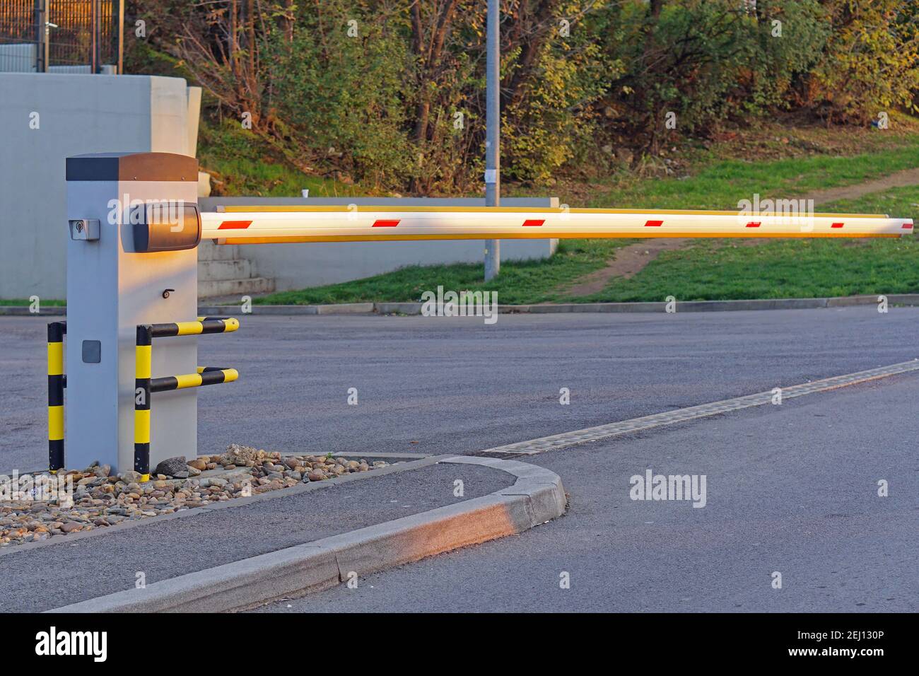 Long boom at automated ramp limited parking access Stock Photo - Alamy