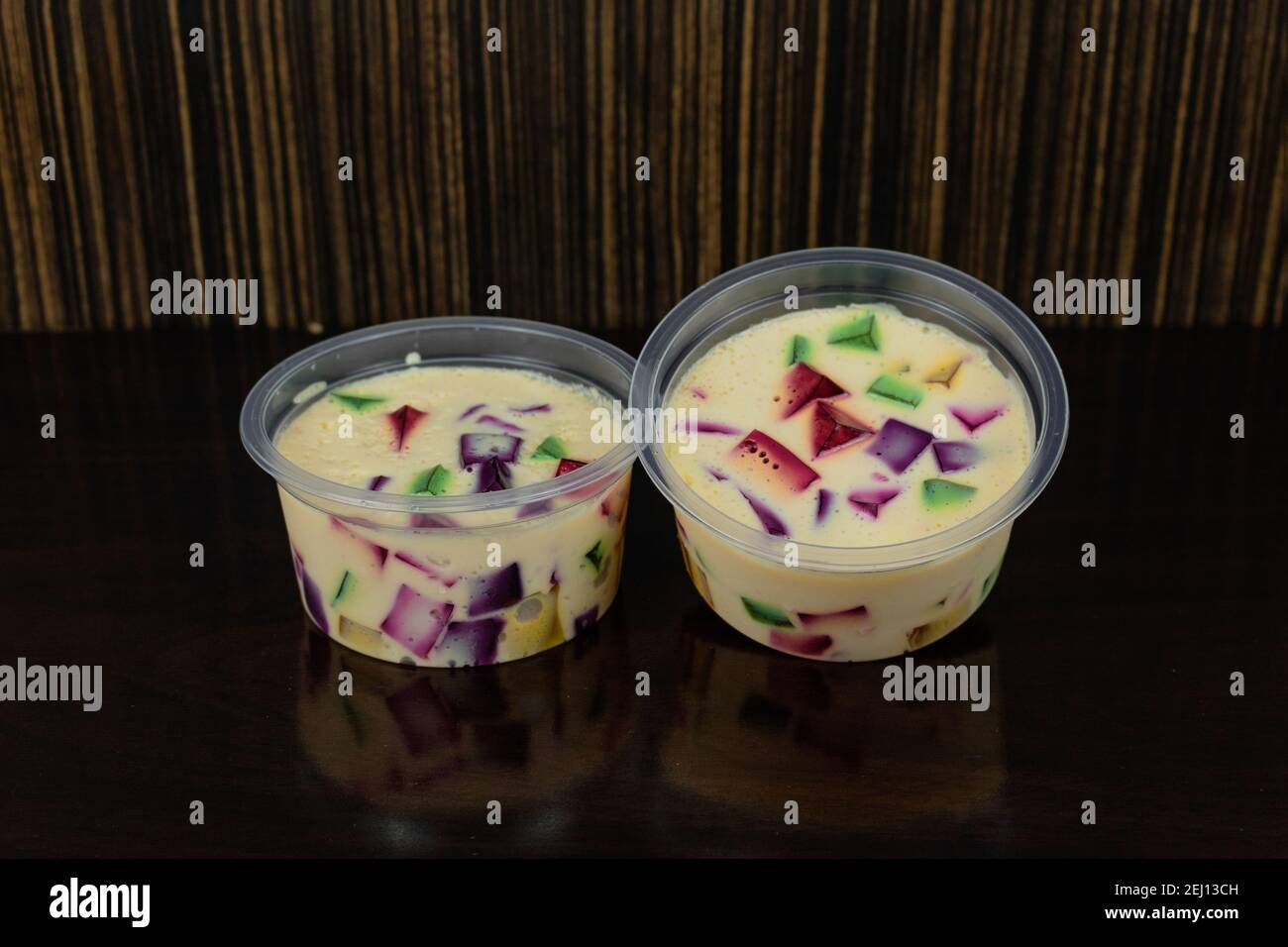 Jelly Colored, brazilian famous sweet. Colorful gelatin on wood table ...