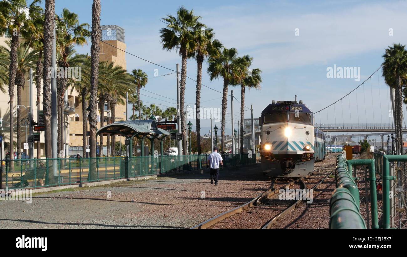 SAN DIEGO, CALIFORNIA USA - 13 FEB 2020: Coaster Commuter and palms ...