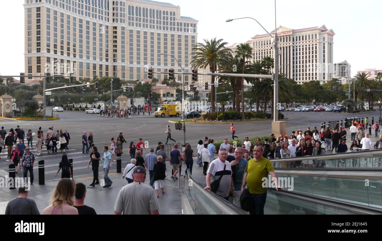 LAS VEGAS, NEVADA USA - 5 MAR 2020: People on pedestrian walkway ...