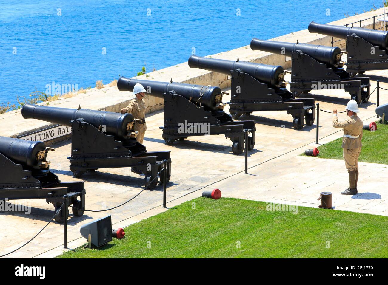 Gunners preparing to fire a SBBL 32-pounder gun at the Saluting Battery ...