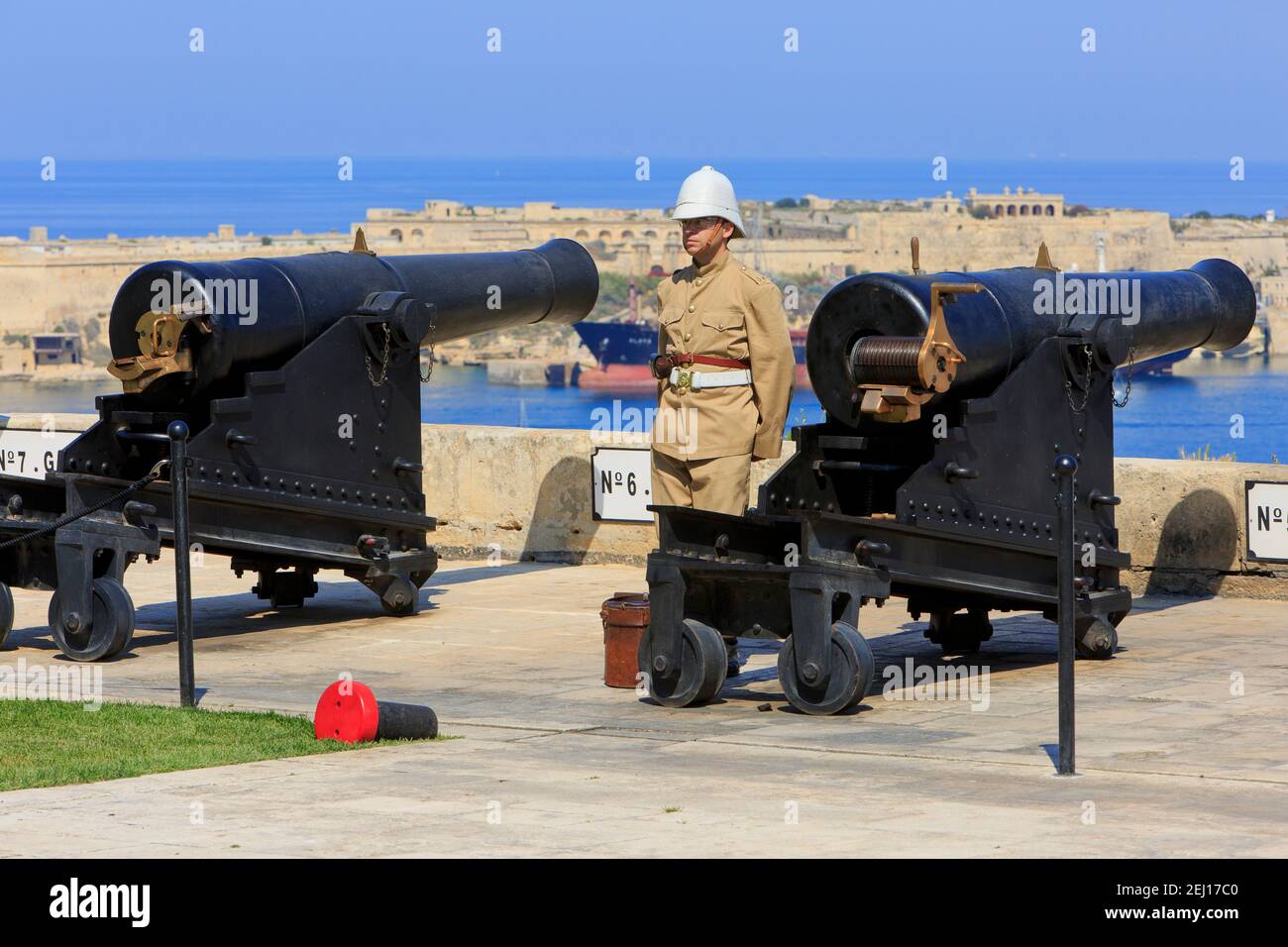 A gunner preparing to fire a SBBL 32-pounder gun at the Saluting ...
