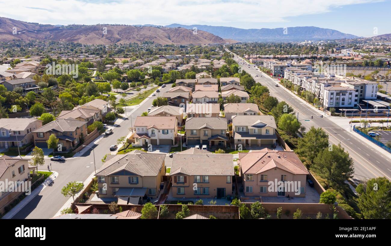 Daytime aerial view of a high density suburban neighborhood in ...