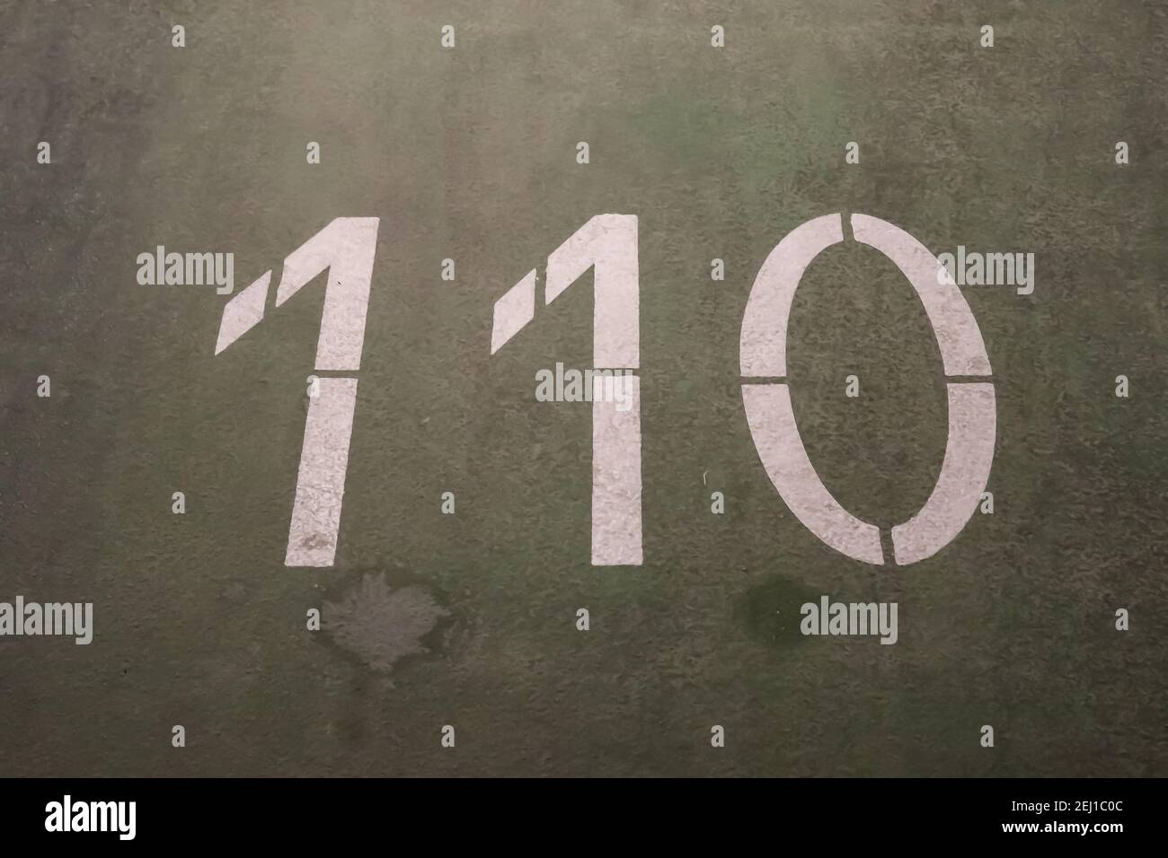 Numbers painted on concrete and asphalt textured surfaces Stock Photo ...