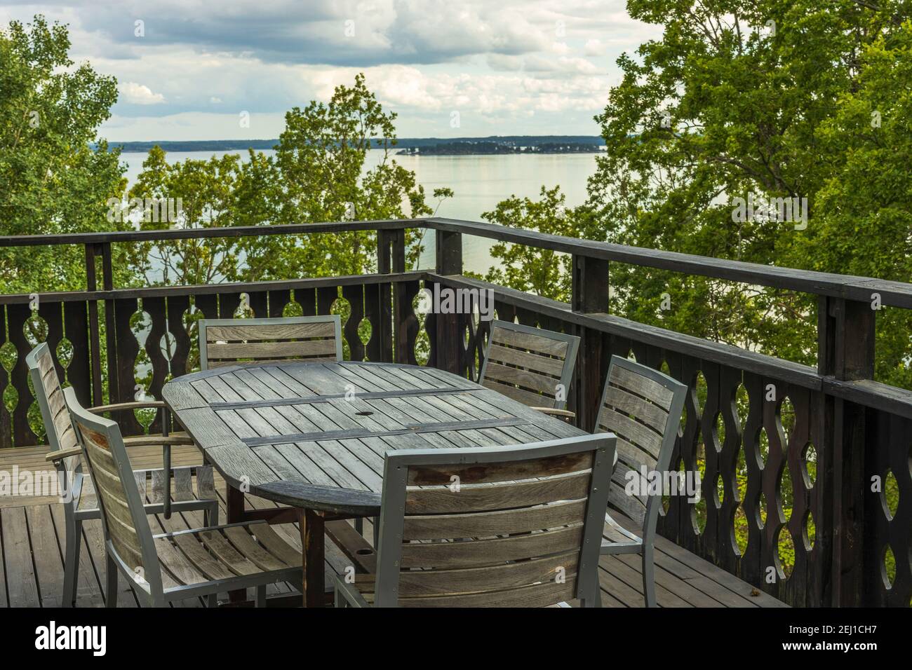 Overview of outdoor wooden veranda around private house with gorgeous ...