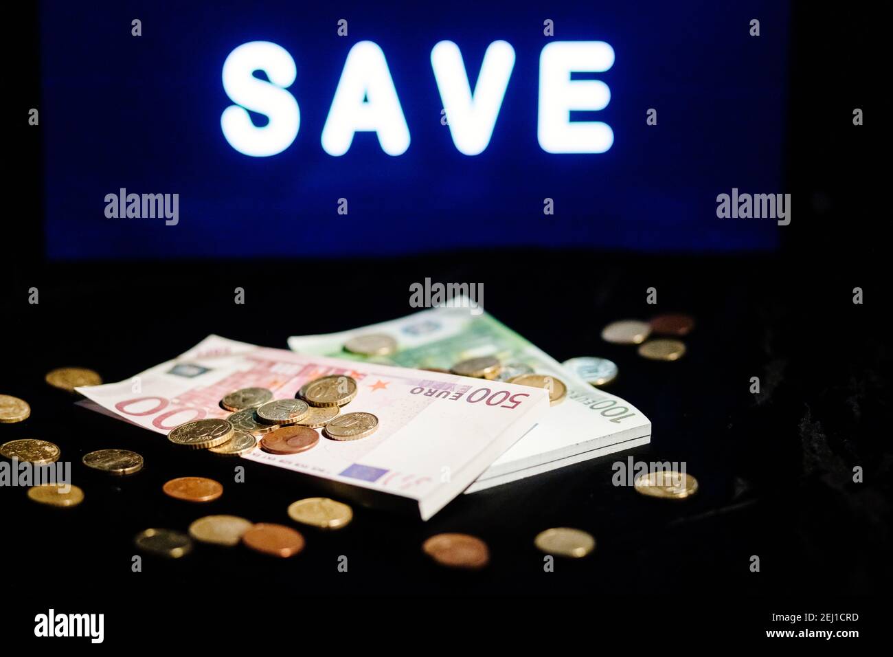 save money income concept with euro banknotes Stock Photo - Alamy