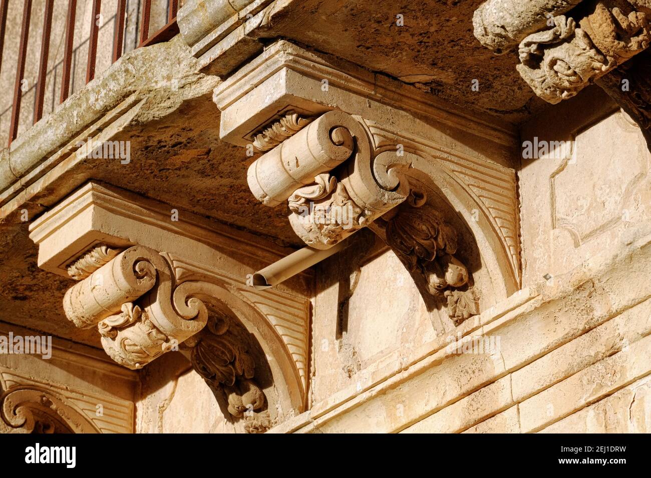 decorative stone corbels in a baroque balcony of Palazzolo Acreide ...