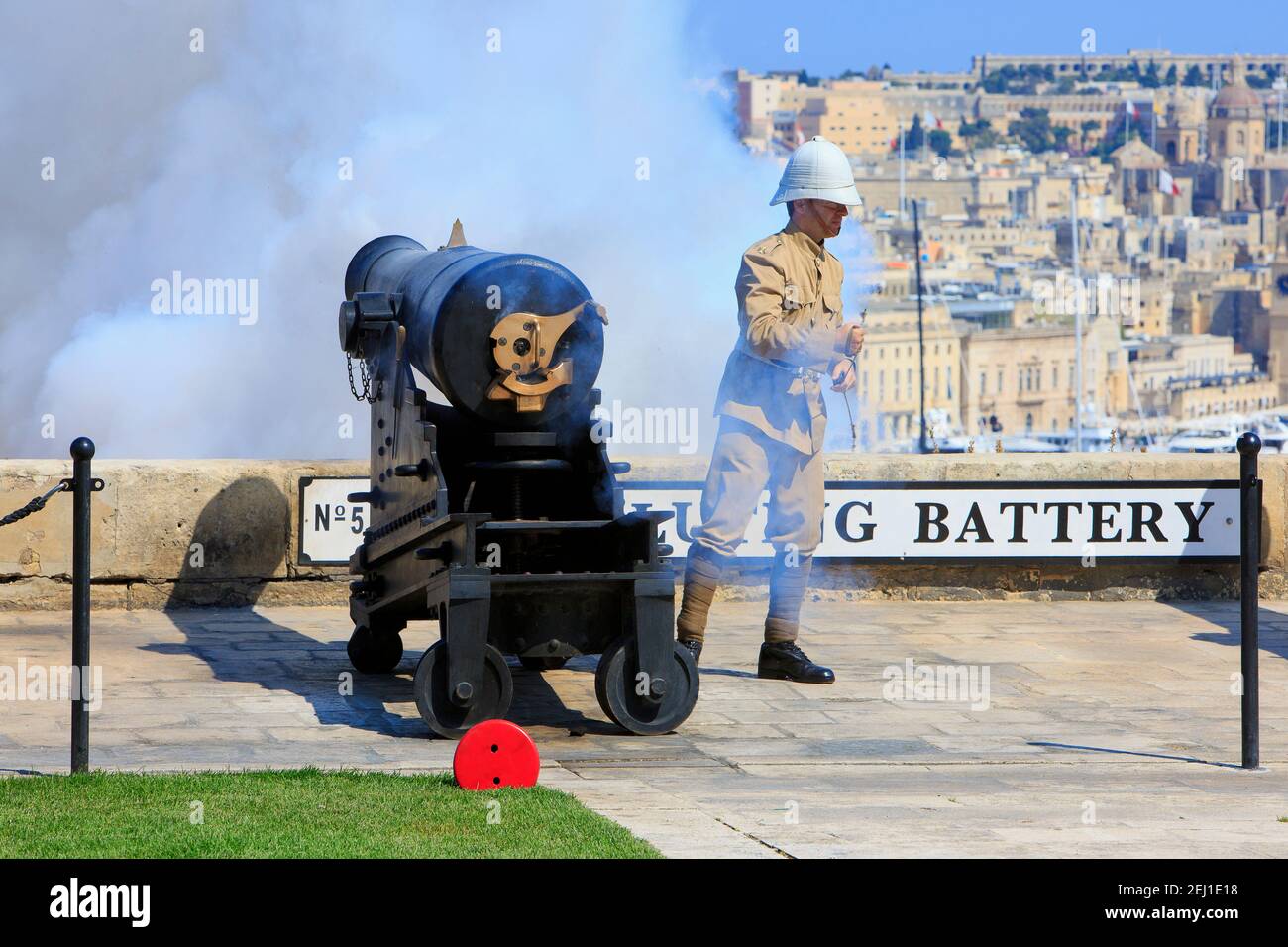 A gunner firing a SBBL 32-pounder gun at the Saluting Battery of the ...