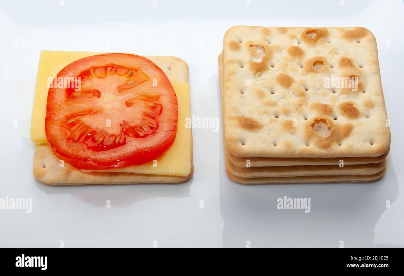 Tomato and cheese on Australian SAO biscuits Stock Photo - Alamy