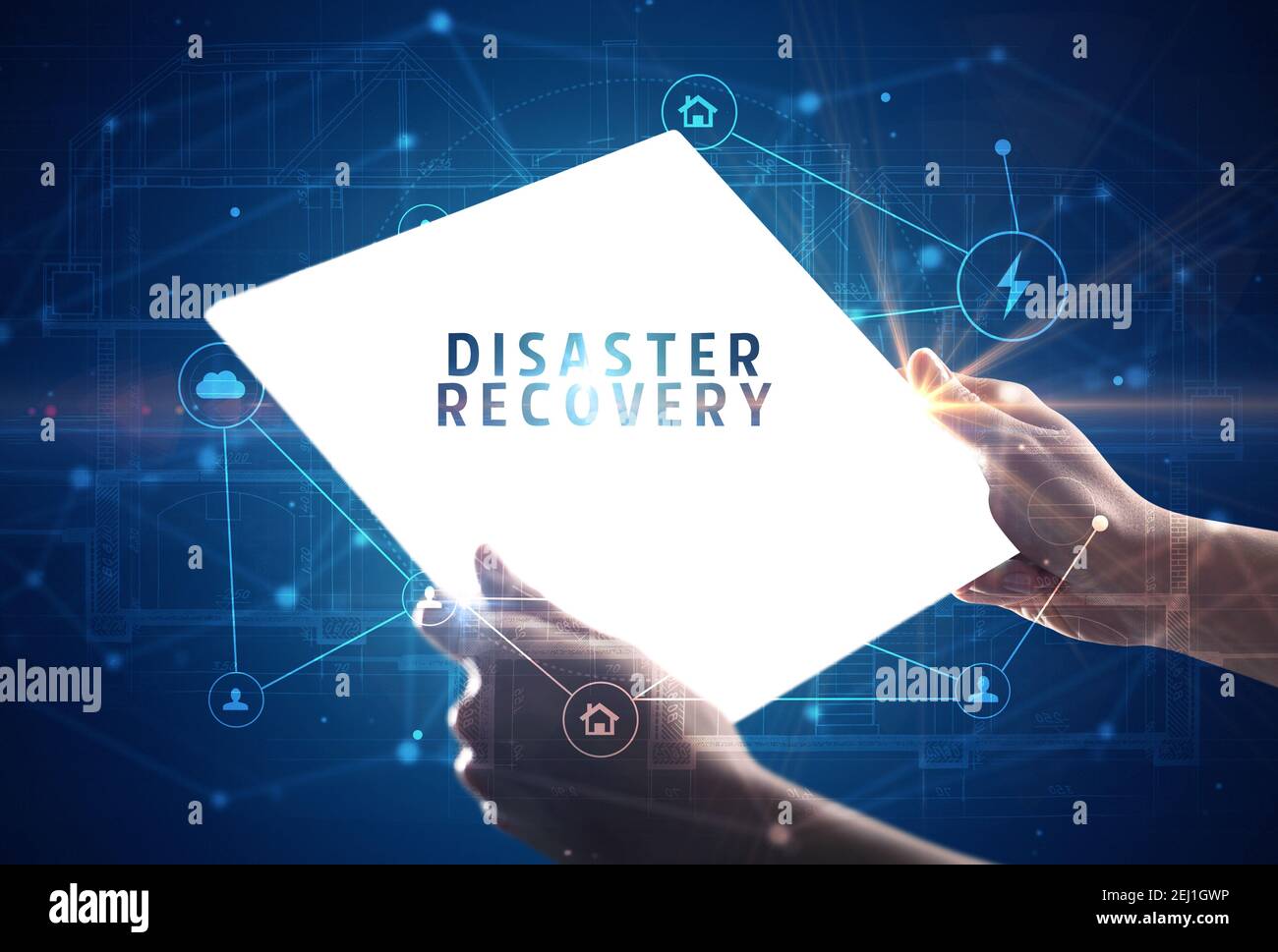Holding futuristic tablet with DISASTER RECOVERY inscription, cyber ...