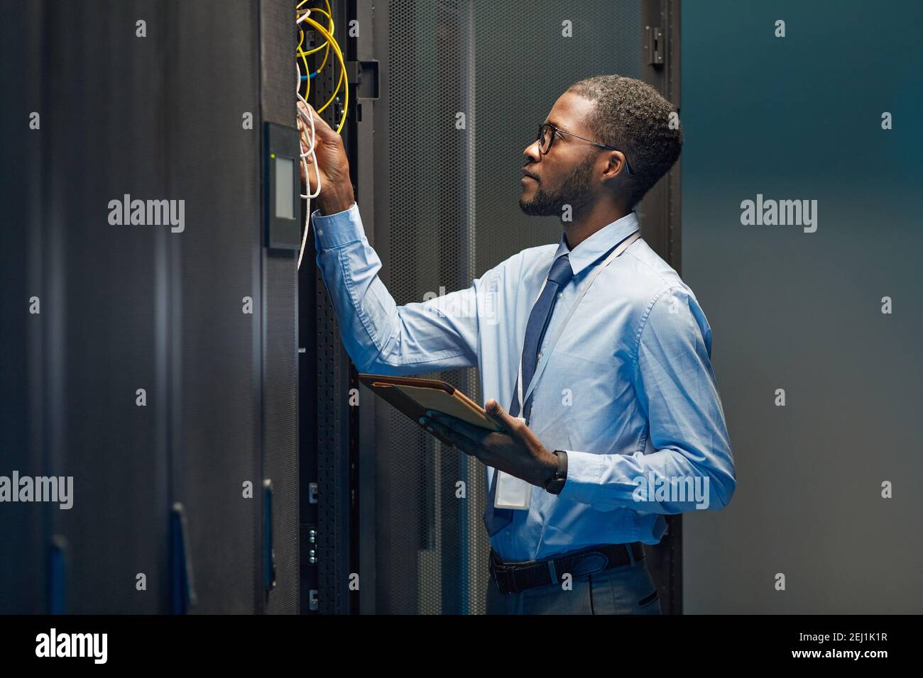 Graphic side view portrait of African American network engineer ...