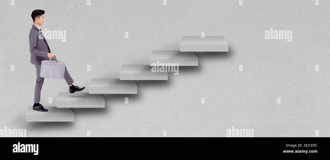 Businessman in suit walking up stair to achievement, man is leader ...