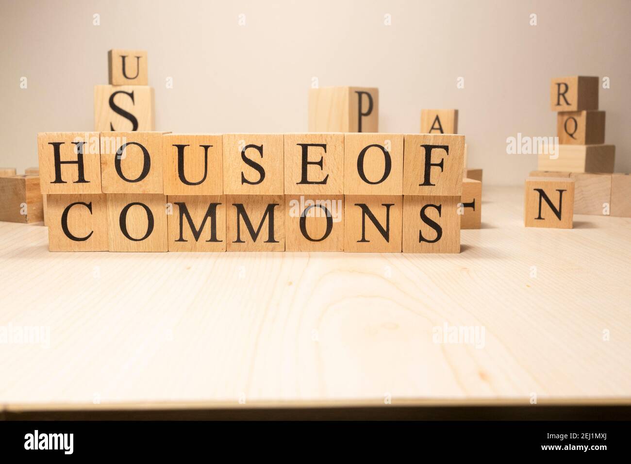 House of commons word from wooden cubes. Terms of economy state ...