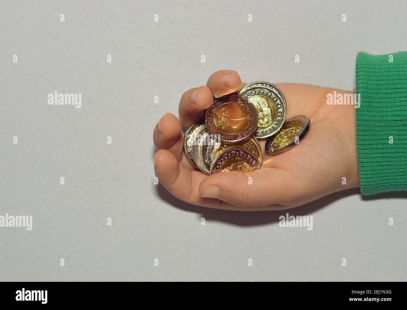 Egyptian child coins hi-res stock photography and images - Alamy