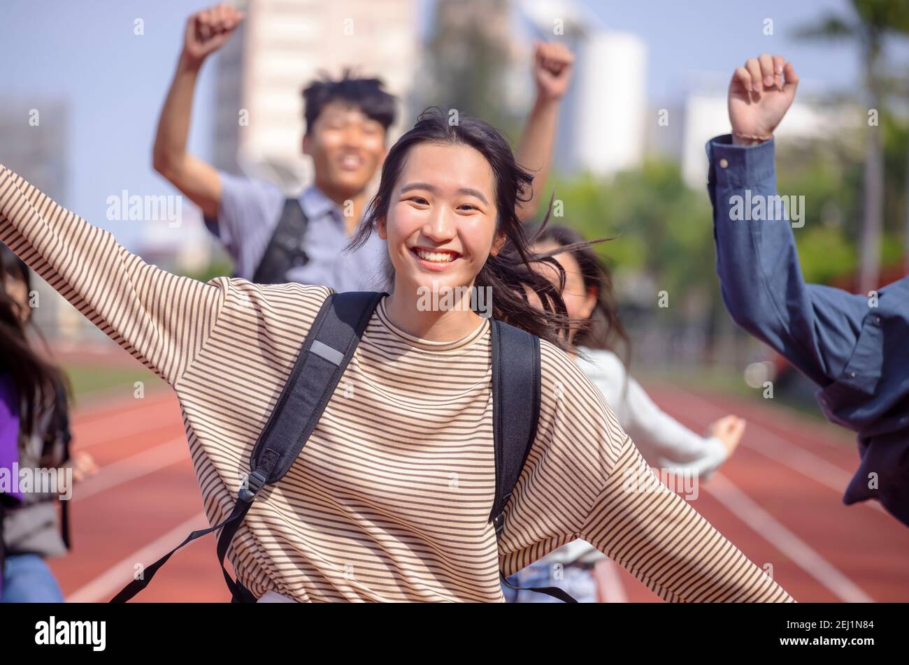Happy teenager Students Running In school Stock Photo - Alamy