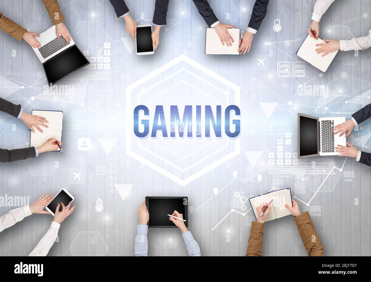Group of Busy People Working in an Office with GAMING inscription ...