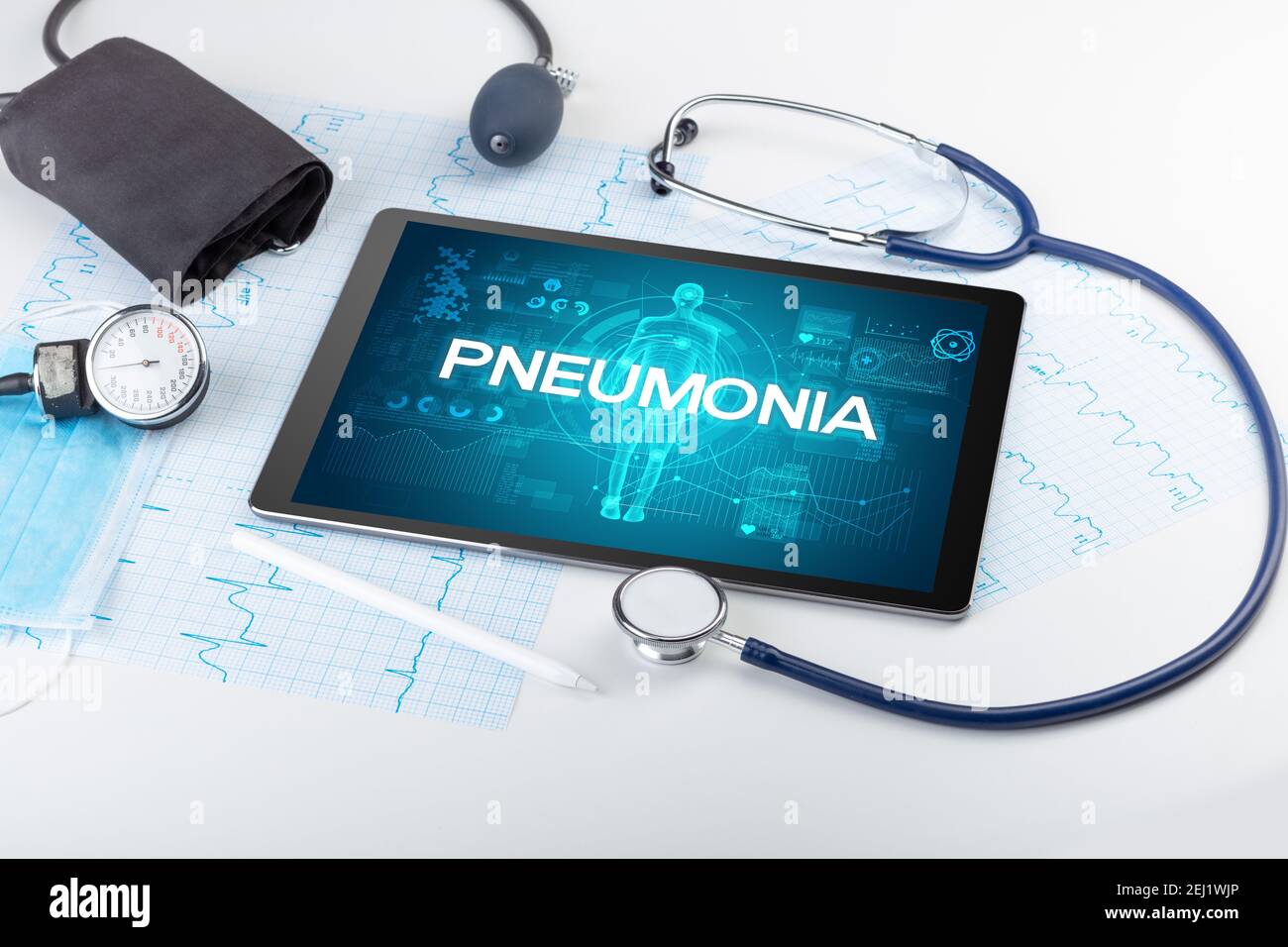Tablet pc and doctor tools with PNEUMONIA inscription, coronavirus ...