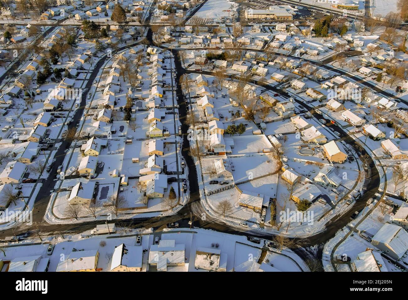 Snowy winter on the residential streets after the snow of a small town ...