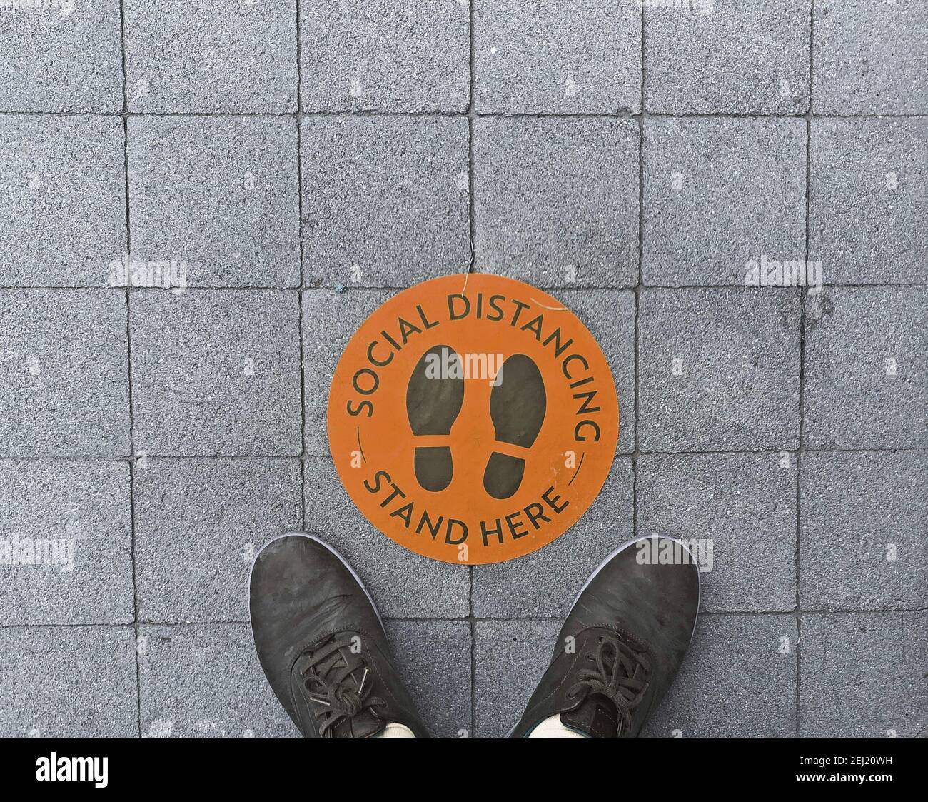 Social Distancing Two Shoes Stock Photo - Alamy