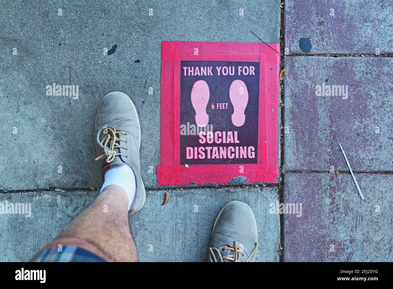 Social Distancing Two Shoes Stock Photo - Alamy