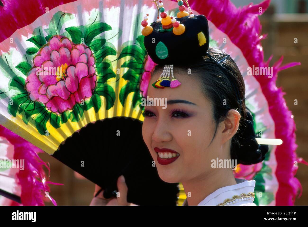 Asia, South Korea, Seoul,portrait of a pretty smiling South Korean girl ...