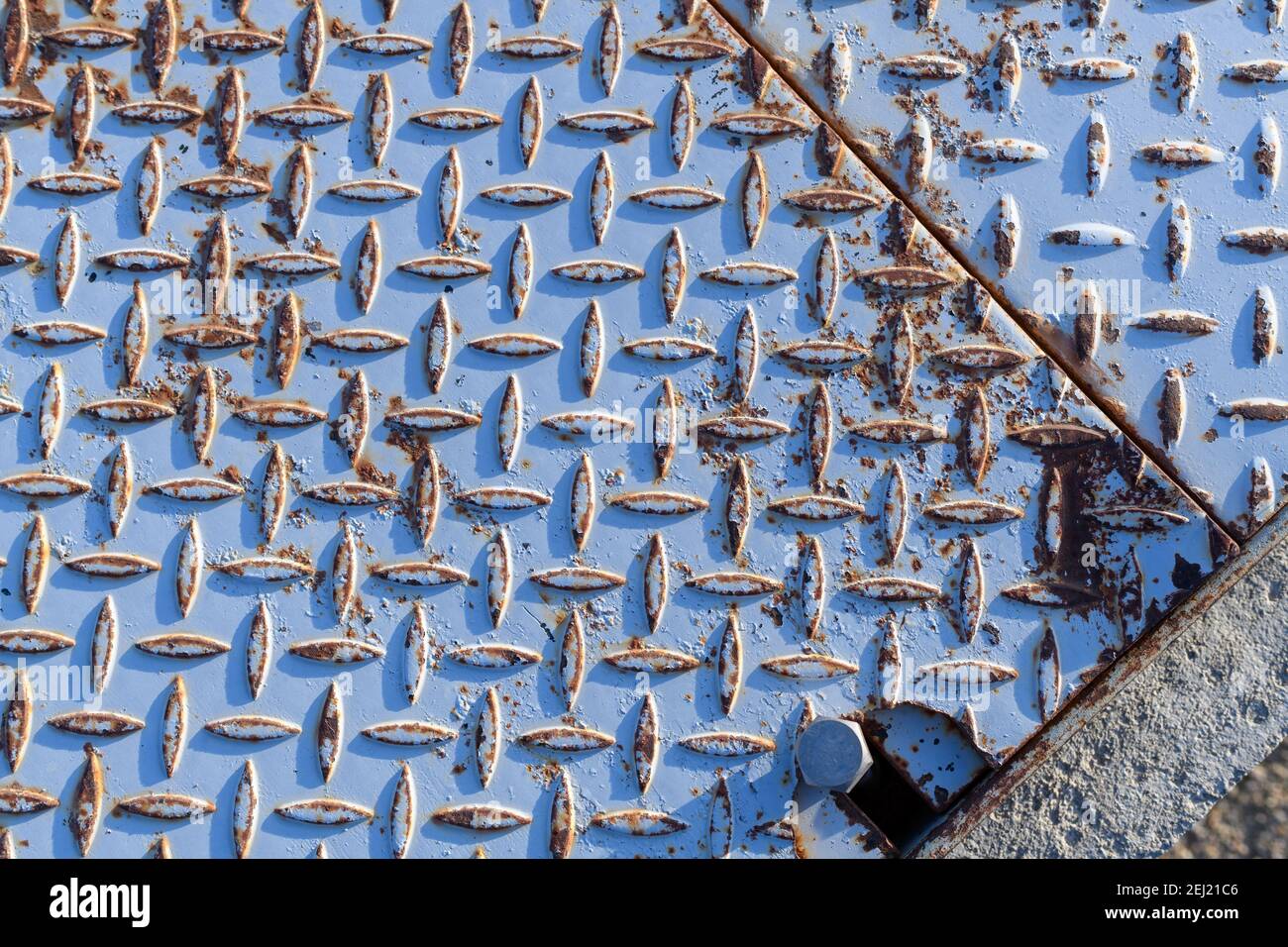 Detail of a diamond pattern metal plate Stock Photo - Alamy