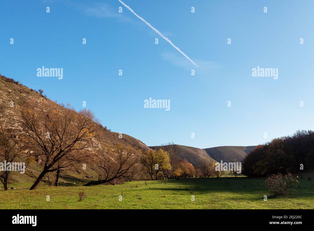 Lush field with hills , nature photography Stock Photo - Alamy