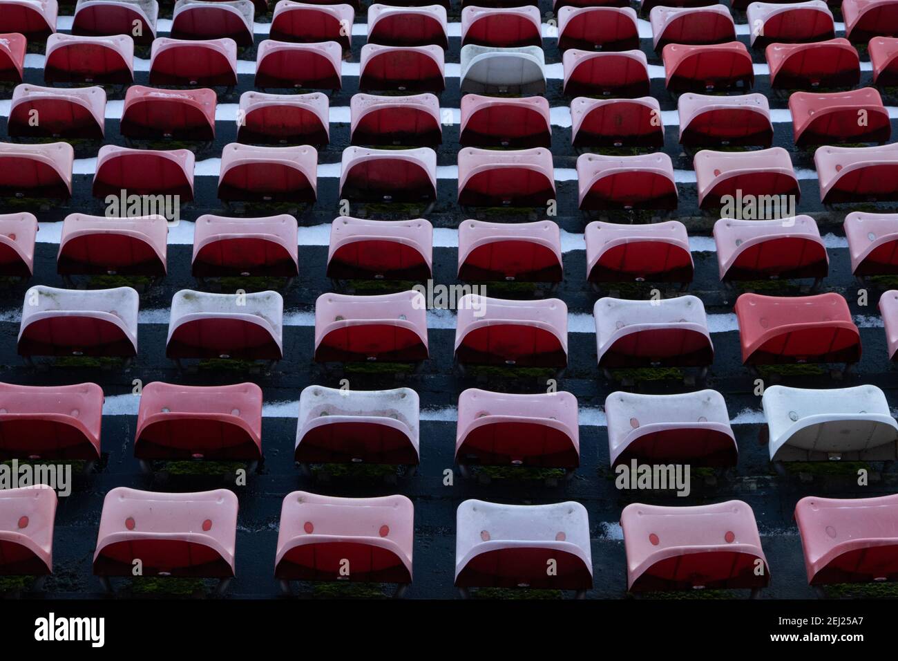 A top view of old empty red bleachers in a stadium Stock Photo - Alamy