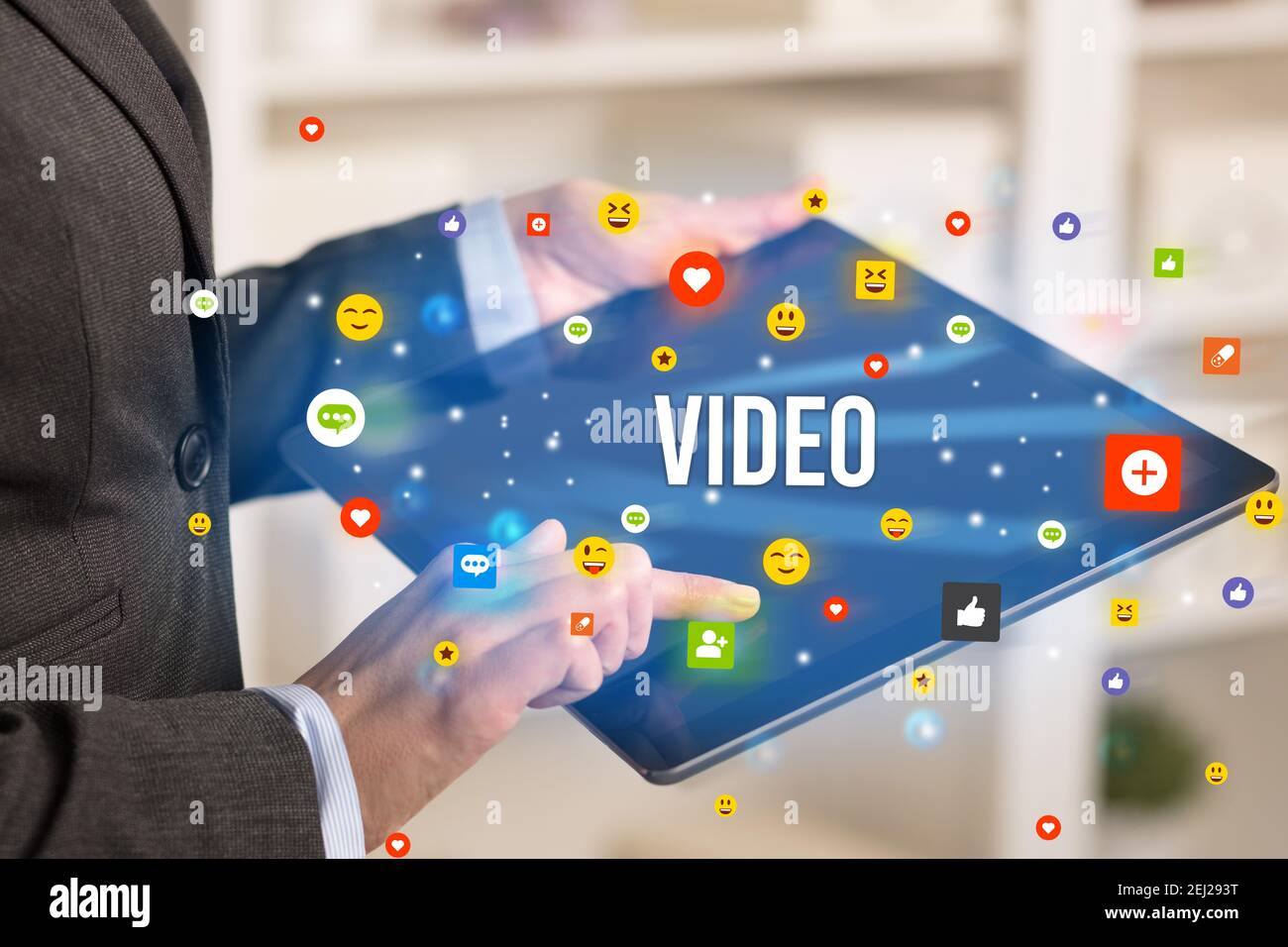 Close up of business person playing multimedia with social media icons ...