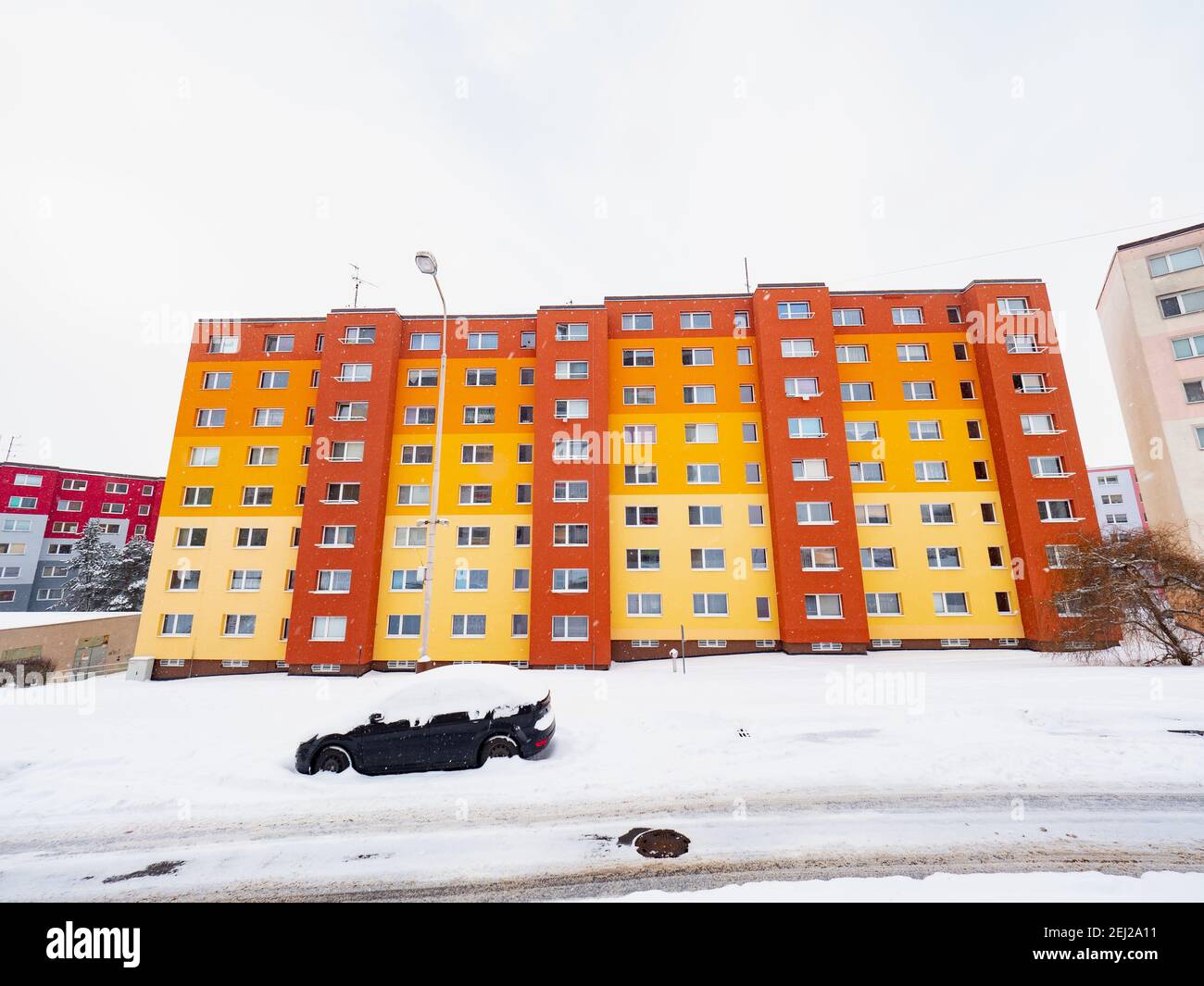 Prefabricated building in winter time. Typical town suburban ...