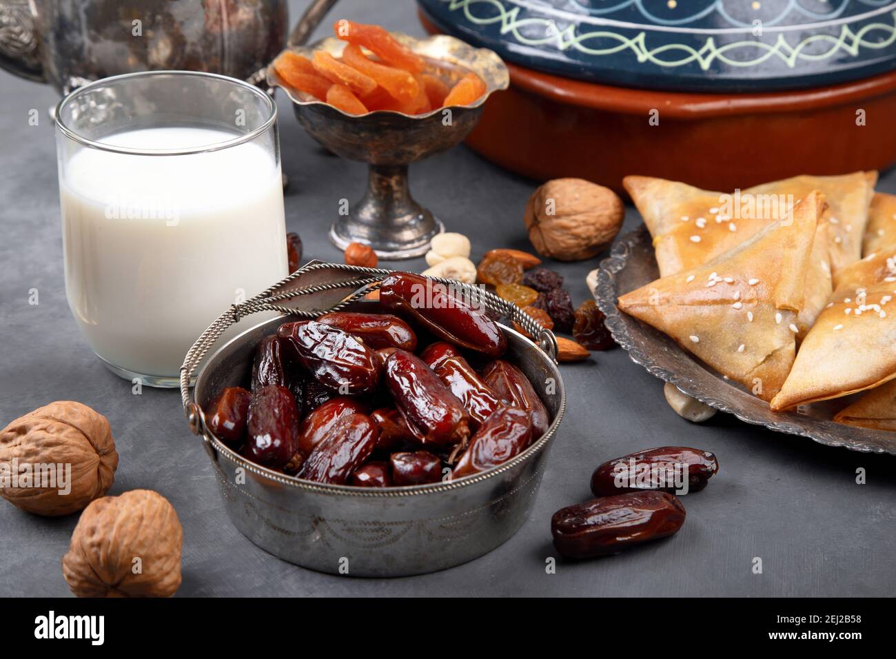 The meal eaten by Muslims after sunset during Ramadan on gray ...
