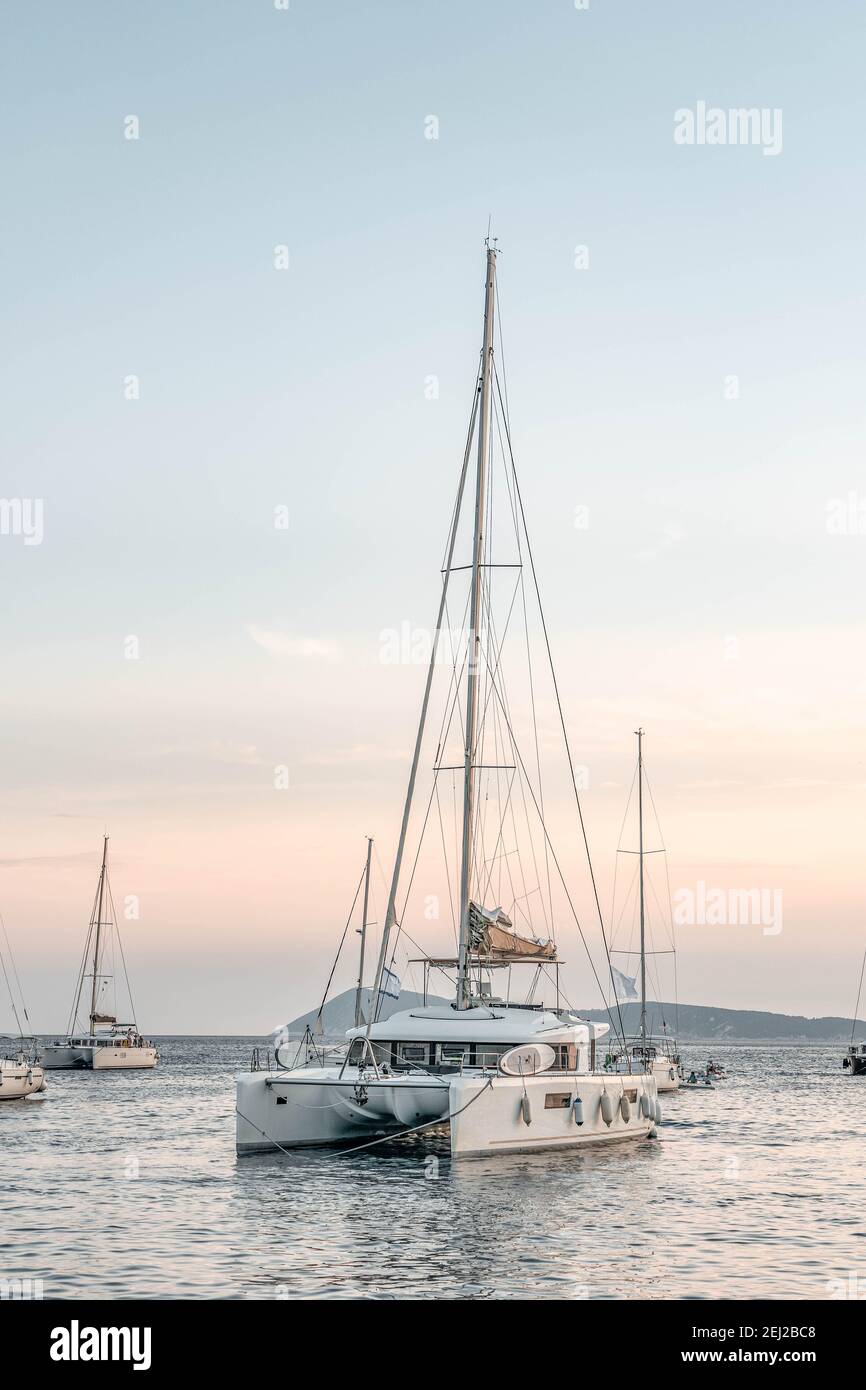Catamaran float on Adriatic sea near Komiza Vis Island in Croatia ...