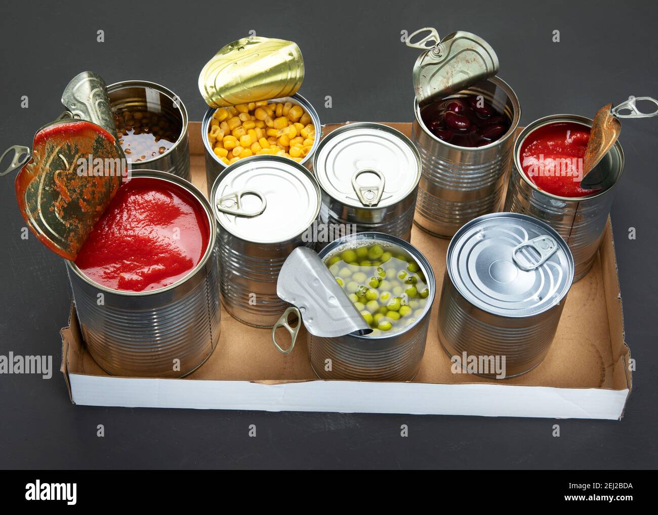 Food cans in box hi-res stock photography and images - Alamy